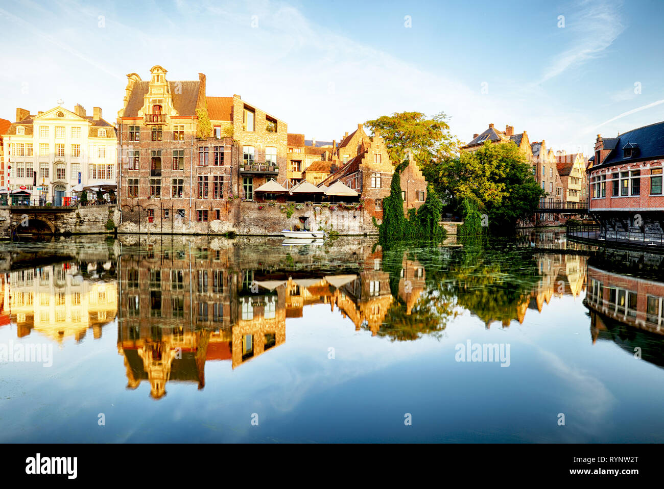 Belgium, Ghent - canal and medieval buildings in popular touristic city ...