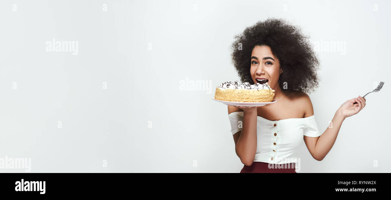So Delicious Positive And Happy Young Afro American Woman With Curly