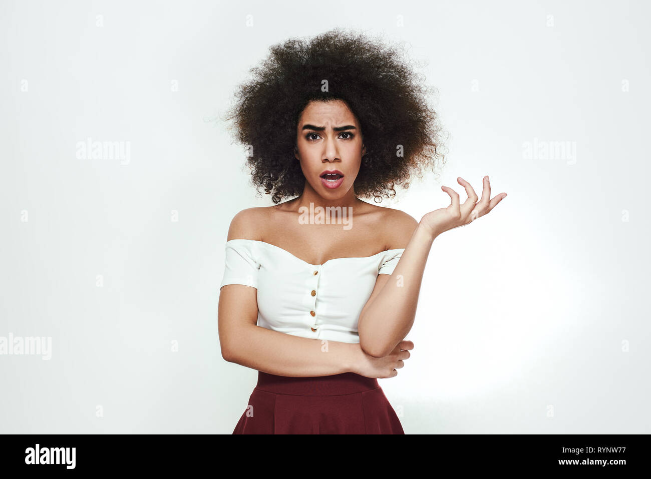 No way! Surprised young afro american woman with opened mouth gesturing ...