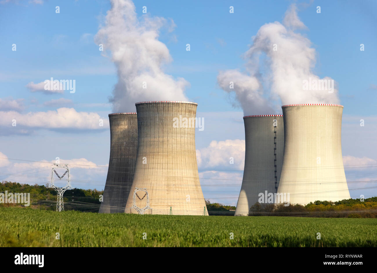 Nuclear power plant with green field Stock Photo - Alamy