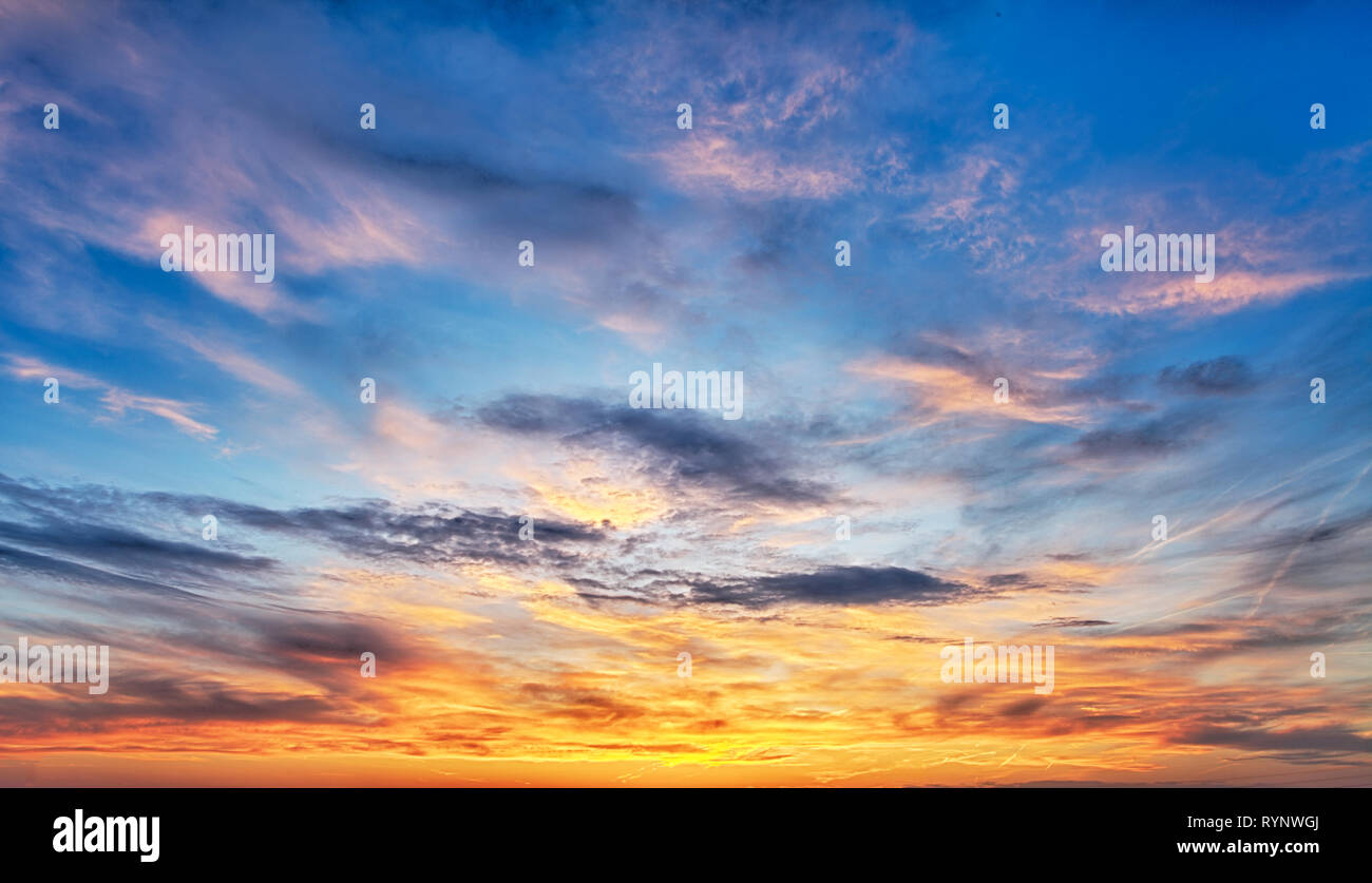 Sunset sky over the sea Stock Photo - Alamy