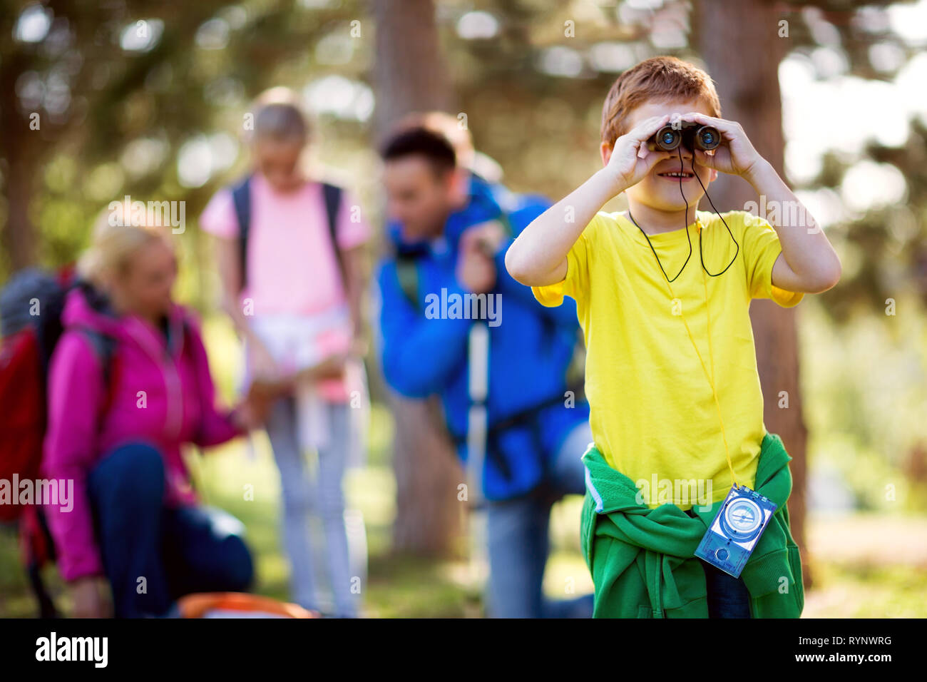 boy looking through binoculars Stock Photo - Alamy