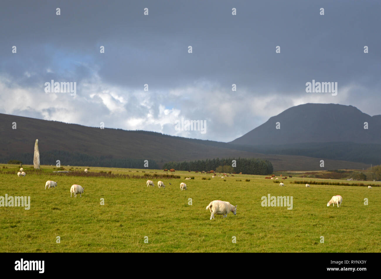 Auchencar standing stone and Beinn Bharrain Isle of Arran Stock Photo ...