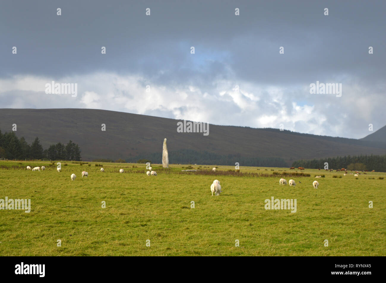 Auchencar standing stone and Beinn Bharrain Isle of Arran Stock Photo ...
