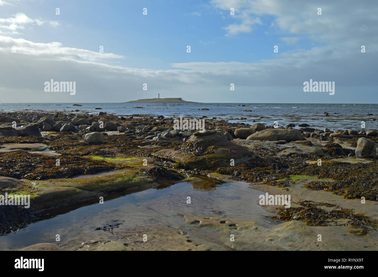 Pladda lighthouse viewed from Kildonan beach on the southern tip Of ...