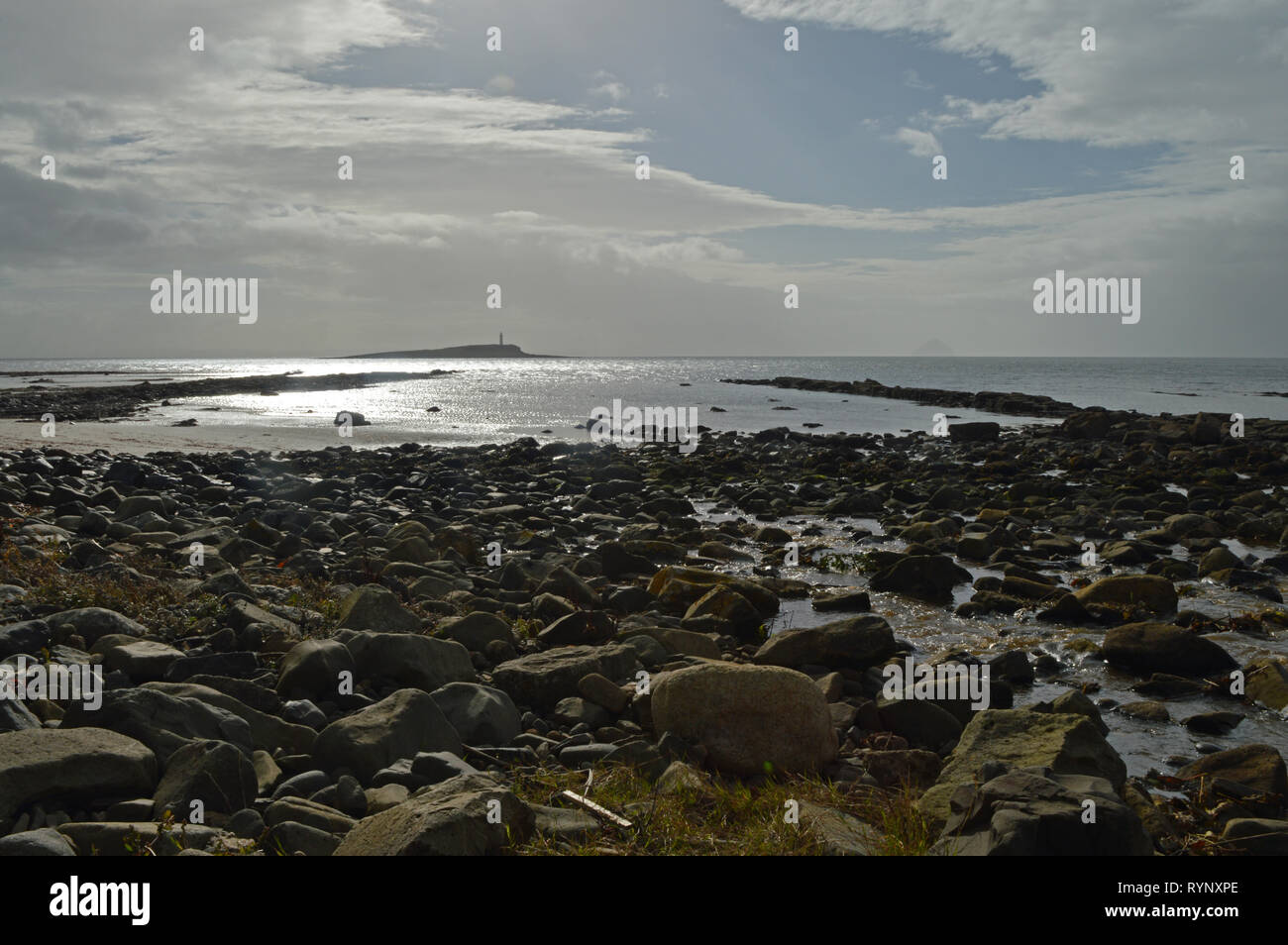 Pladda lighthouse viewed from Kildonan beach on the southern tip Of ...