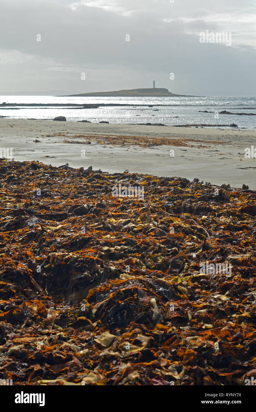 Pladda lighthouse viewed from Kildonan beach on the southern tip Of ...