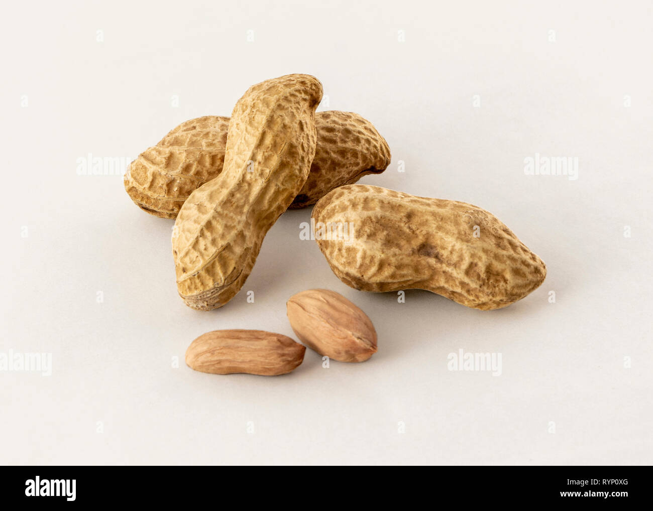 Dried peanuts in shell, cluster Stock Photo - Alamy