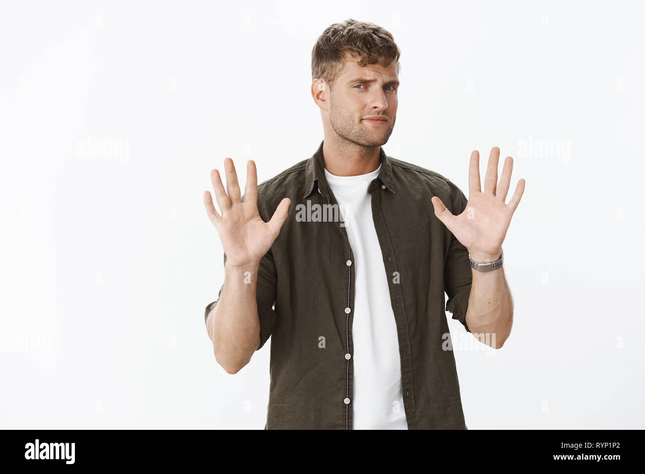 No thanks. Hesitant unimpressed and displeased good-looking male ...