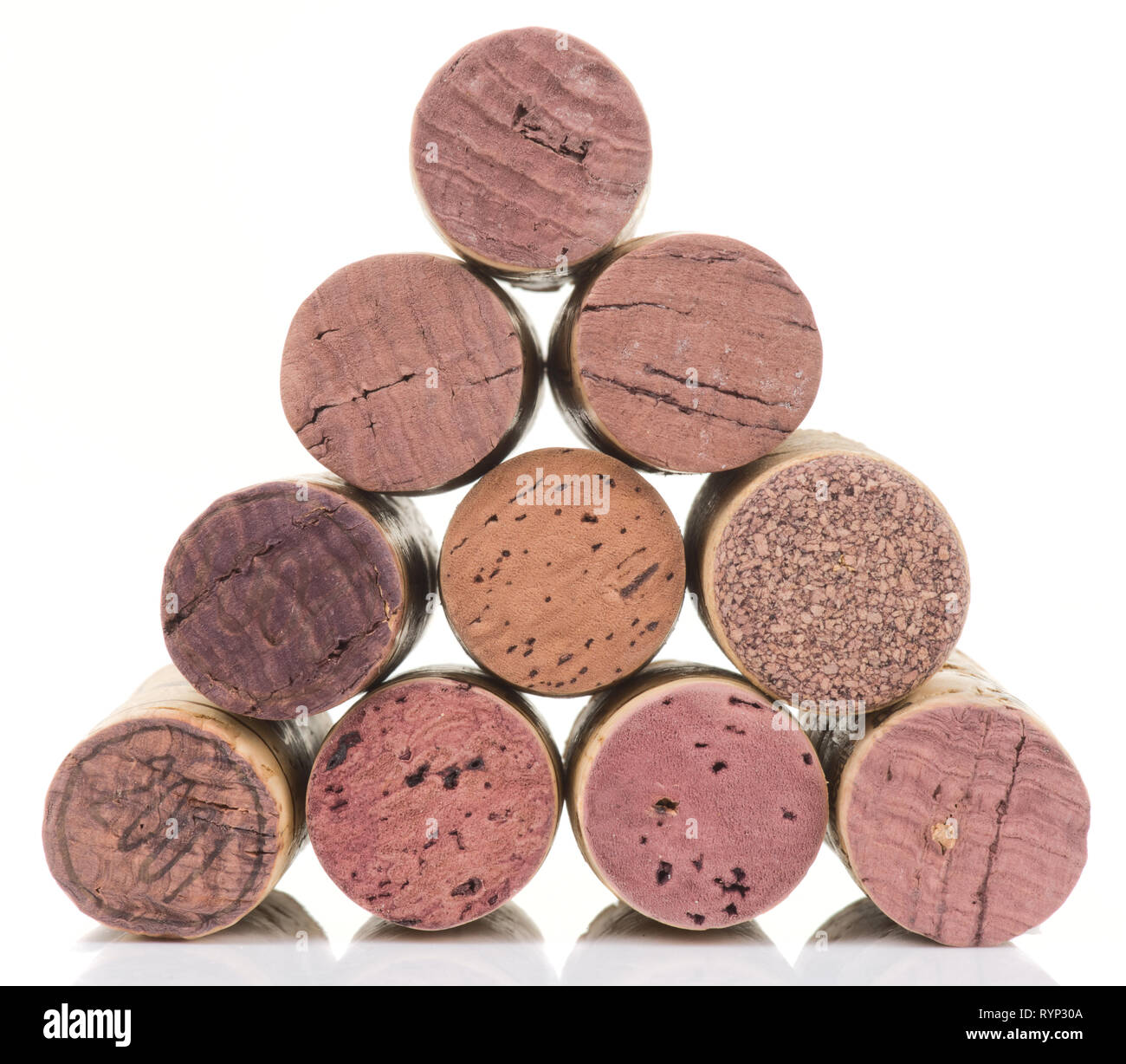 Old wine corksarranged in pyramid, isolated on white Stock Photo - Alamy