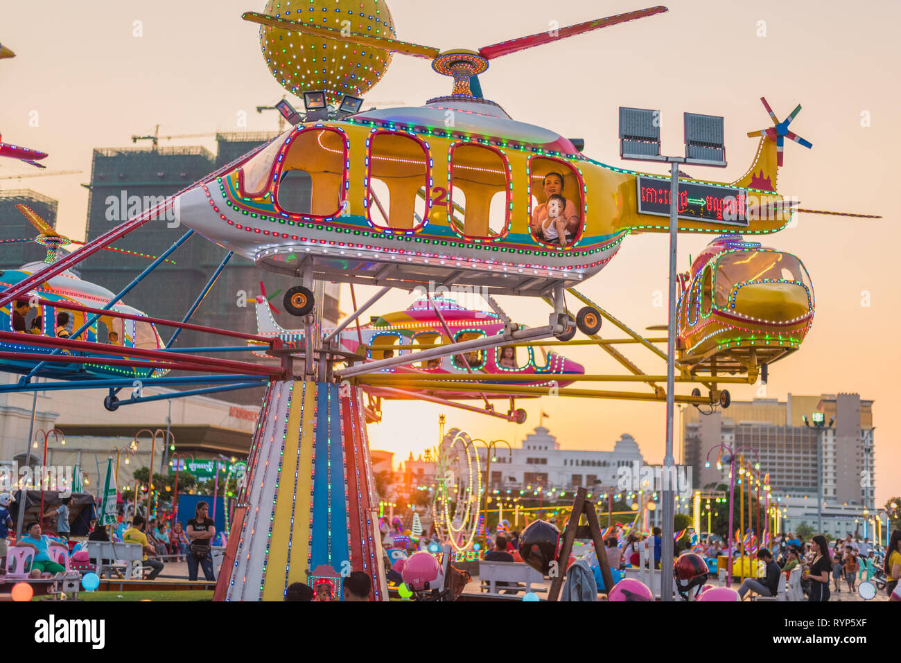 Asian child carousel ride hi-res stock photography and images - Alamy