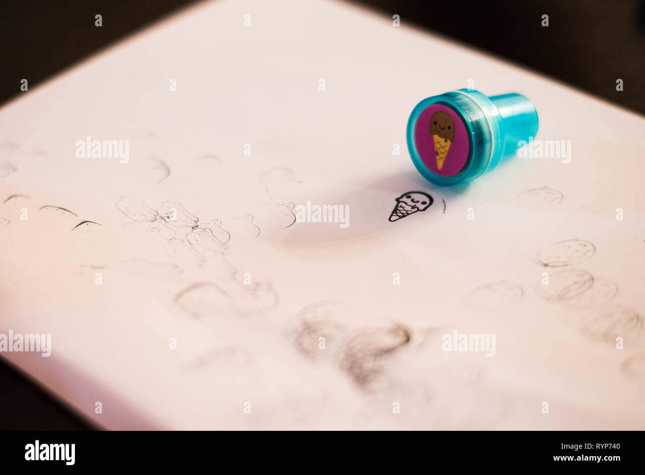 Inking the paper Stock Photo - Alamy