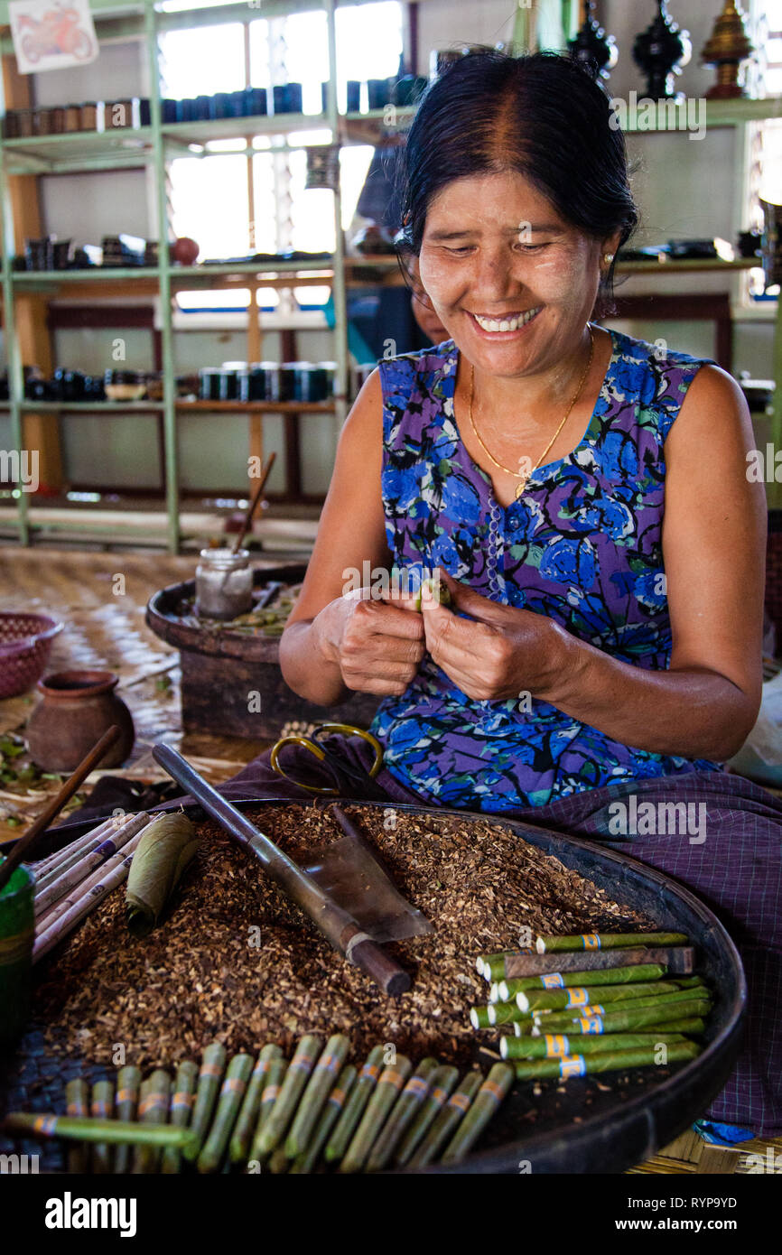Traditional cheroot makers roll cheroots by hand at Inle Lake, Myanmar ...