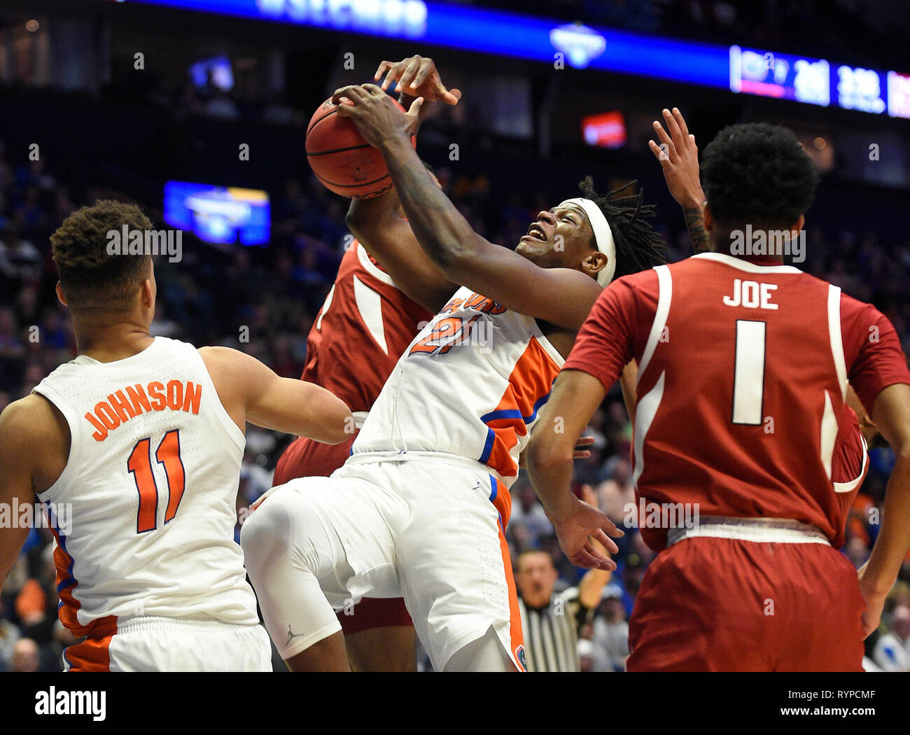 March 14, 2019; Florida Gators forward Dontay Bassett (21) and Arkansas ...