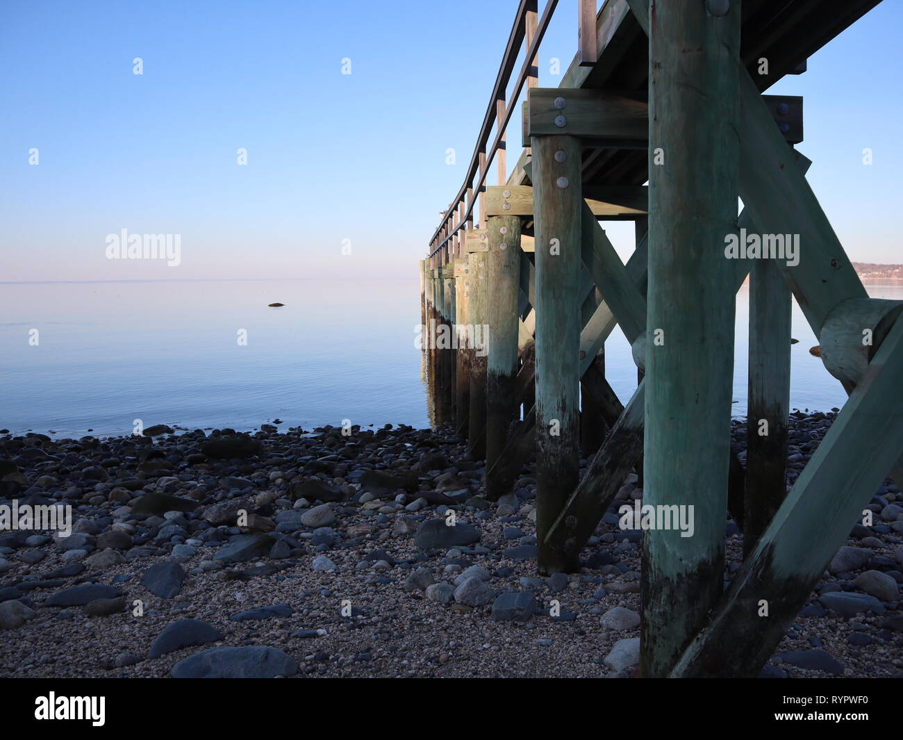 Pier at the ocean Stock Photo - Alamy