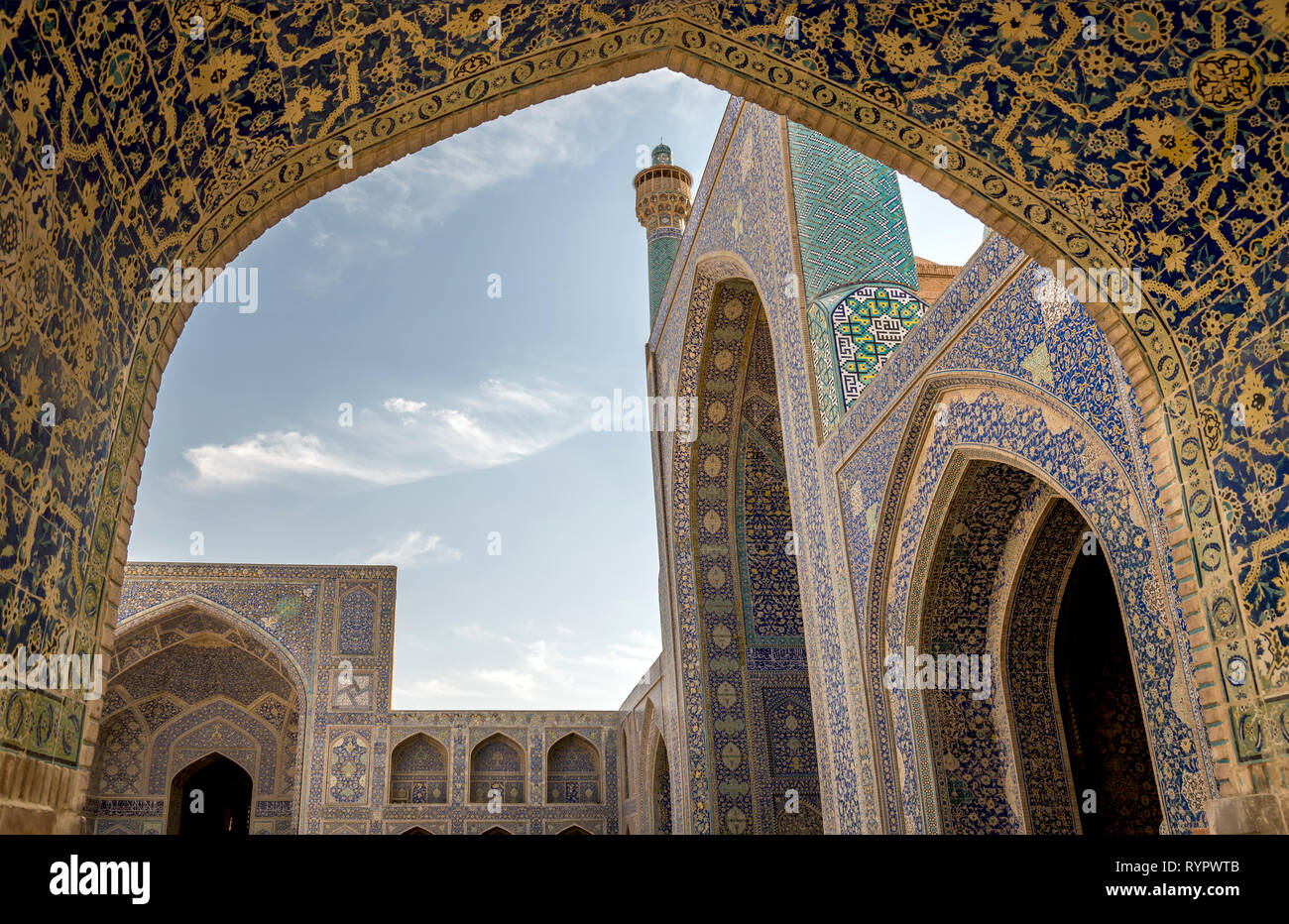 View of New Shah Abbas Mosque from arcade to courtyard with madrasa and ...