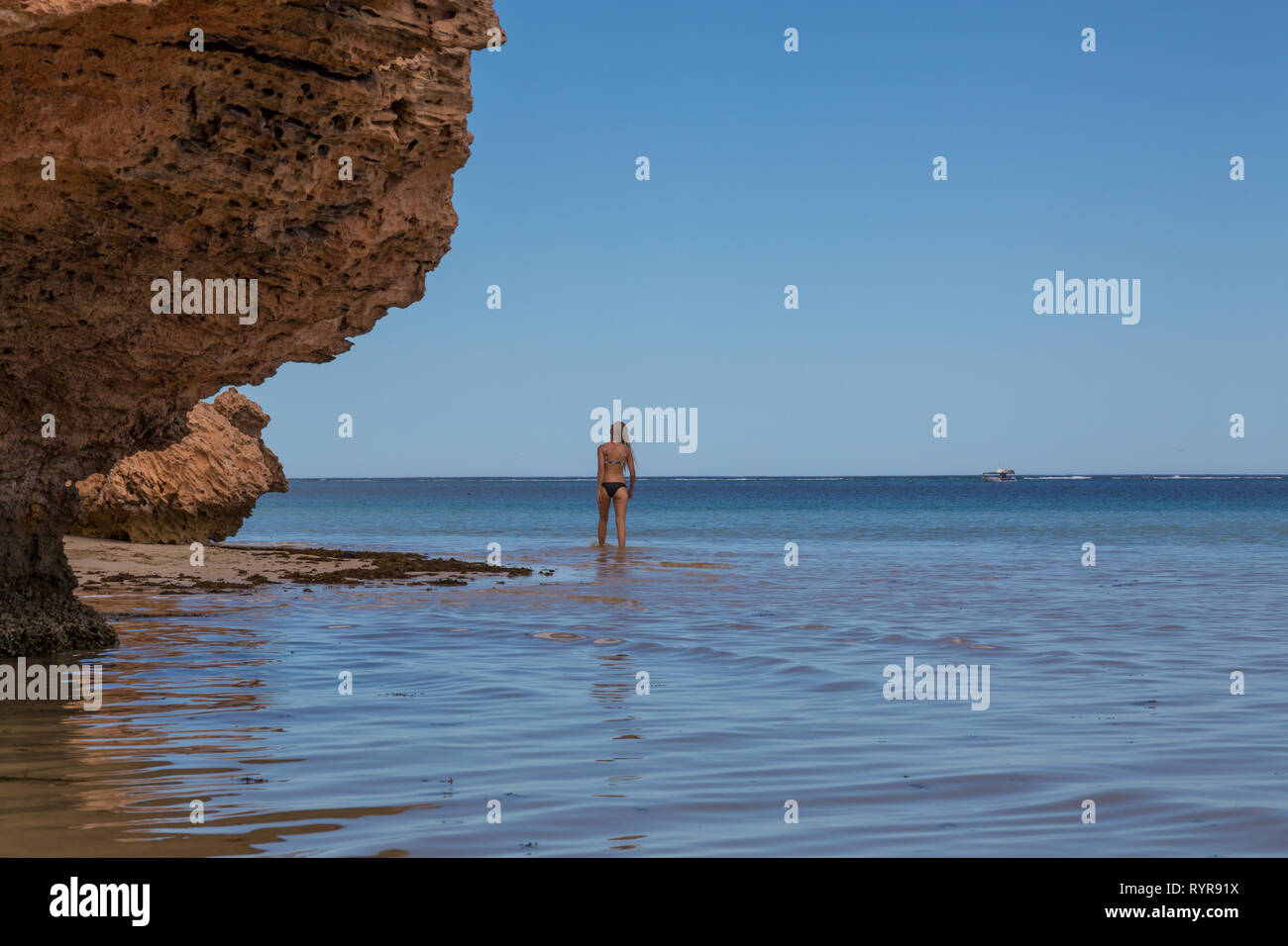 Young lady on a beach in western Australia Stock Photo - Alamy