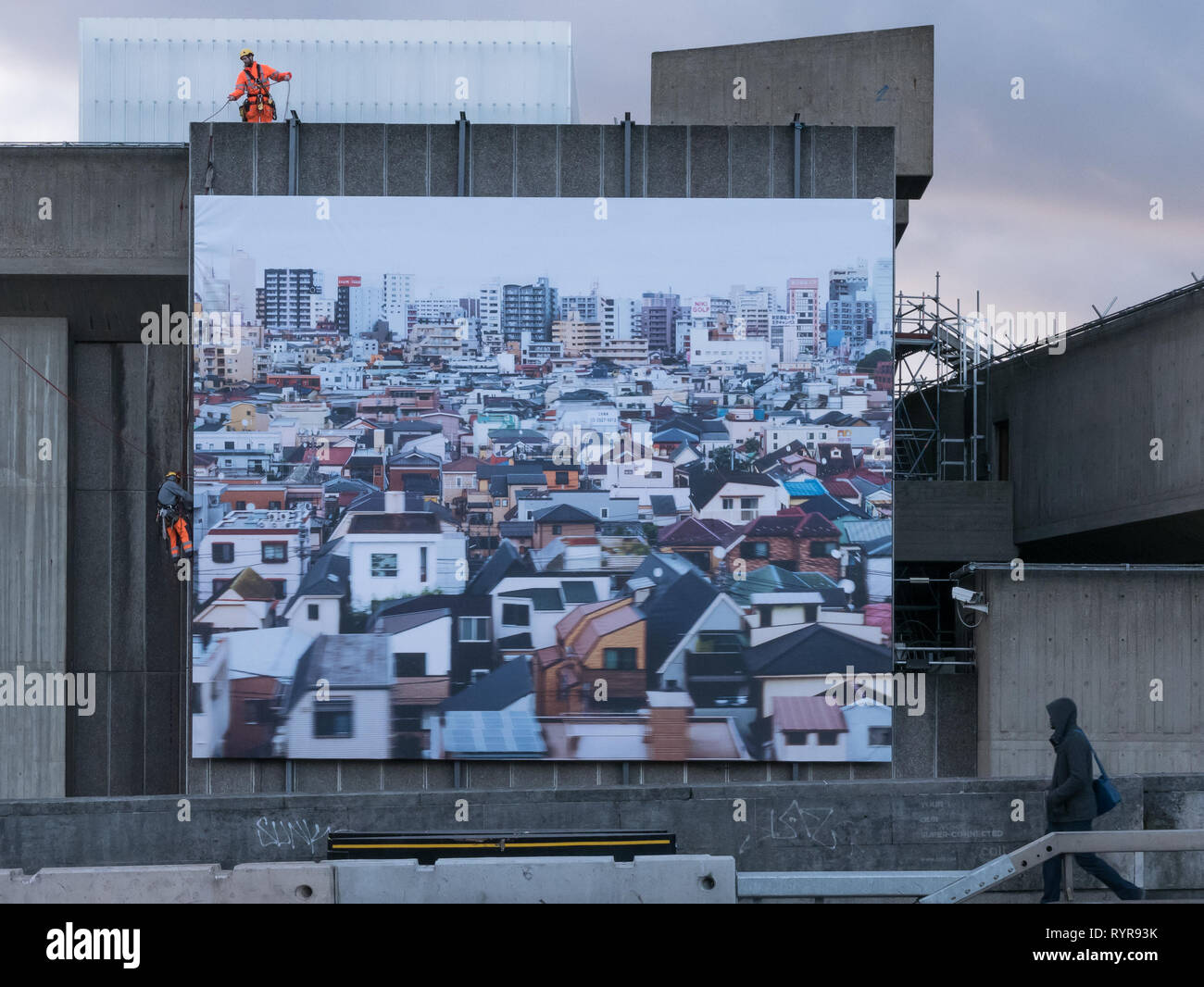 Man hanging billboard hi-res stock photography and images - Alamy
