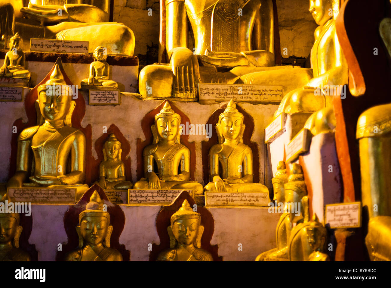 Gold Buddha statues at the Shwe Oo Min Cave of 1000 Buddhas, Pindaya ...