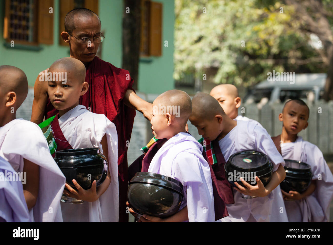 Novice monk eating hi-res stock photography and images - Alamy