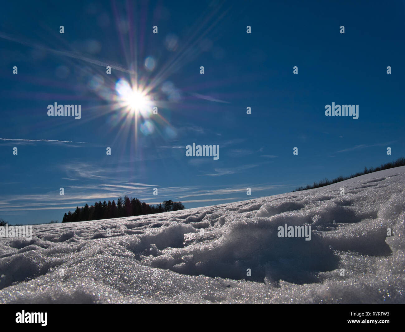 Sunbeams snowy winter mountains hi-res stock photography and images - Alamy