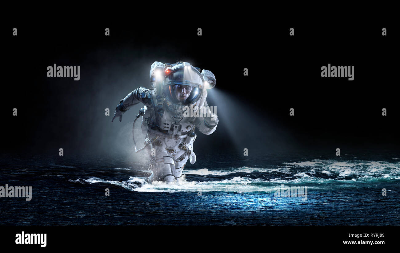 Spaceman running fast. Mixed media Stock Photo - Alamy