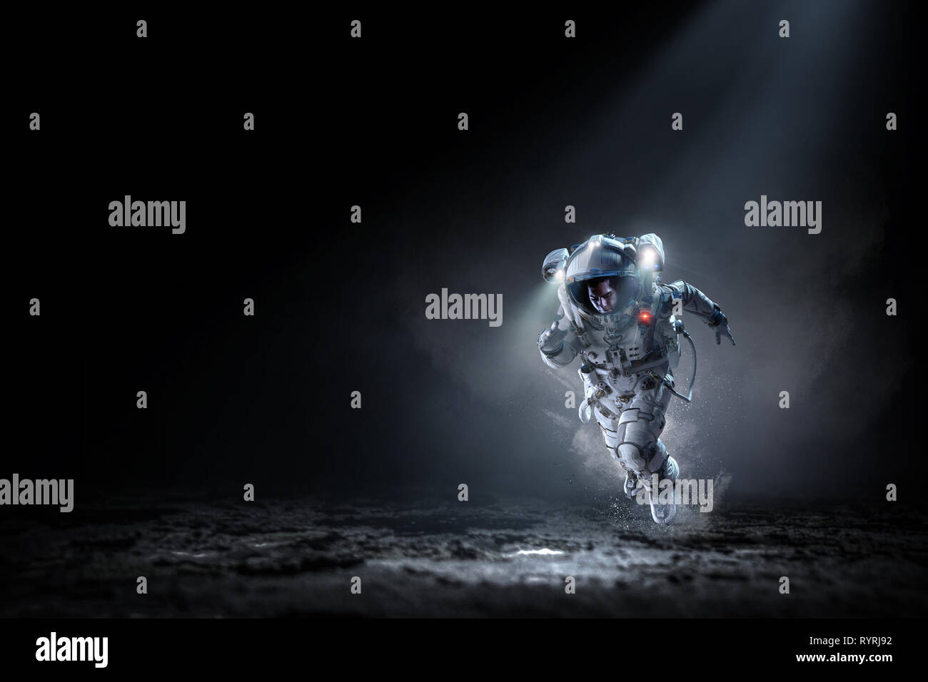 Spaceman running fast. Mixed media Stock Photo - Alamy