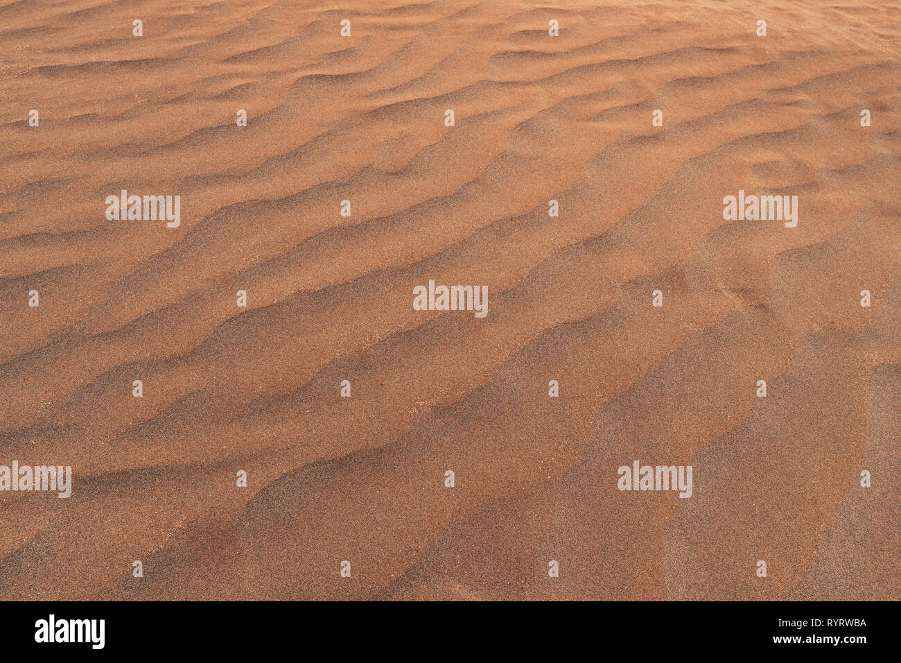 Sand dunes background Stock Photo - Alamy