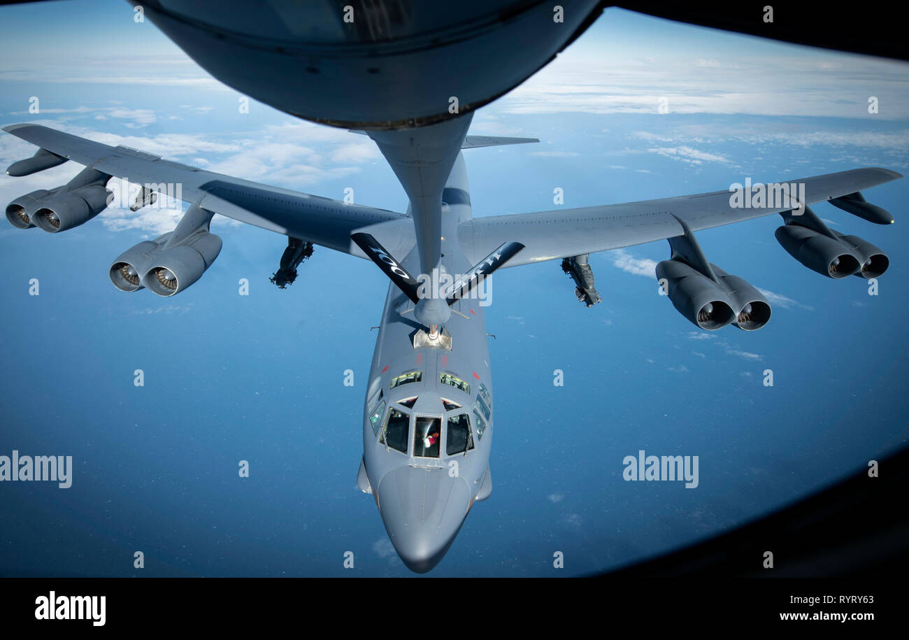 A U.S. Air Force B-52 Stratofortress receives fuel from a KC-135 ...