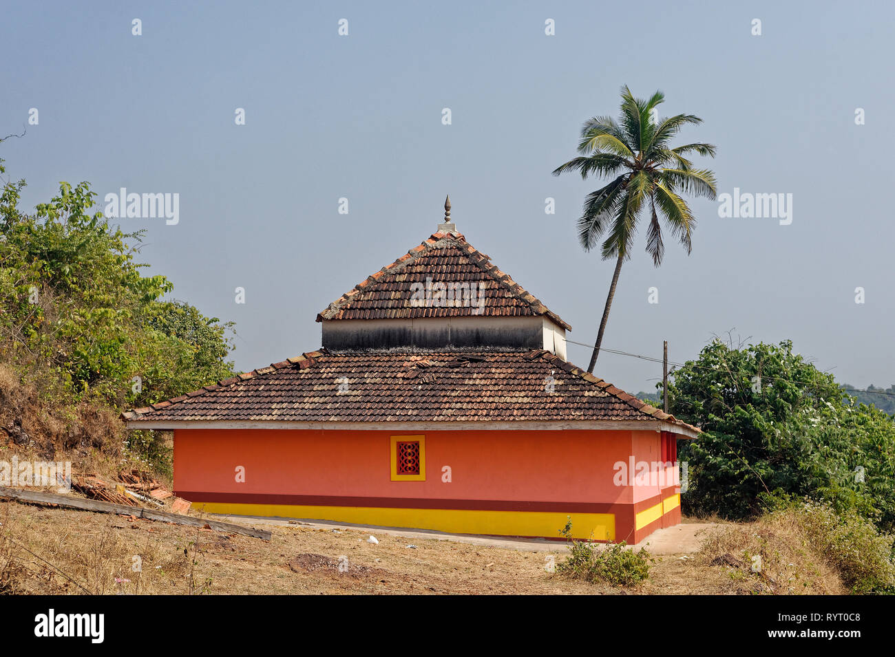 Traditional old tiled roof Hindu temple on the hill top Stock Photo - Alamy