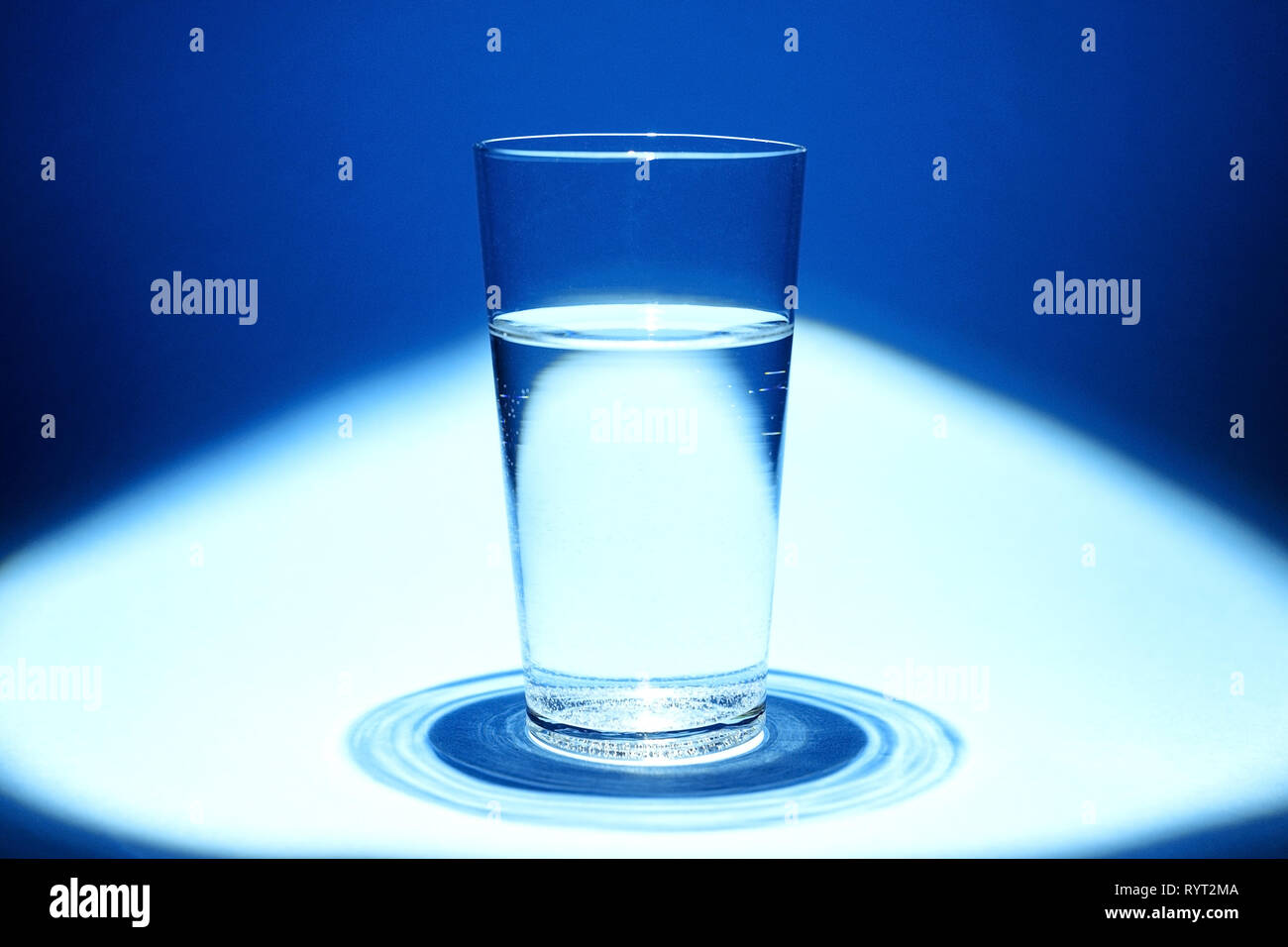 glass of clean water on blue background. concept of ecology. healthy ...