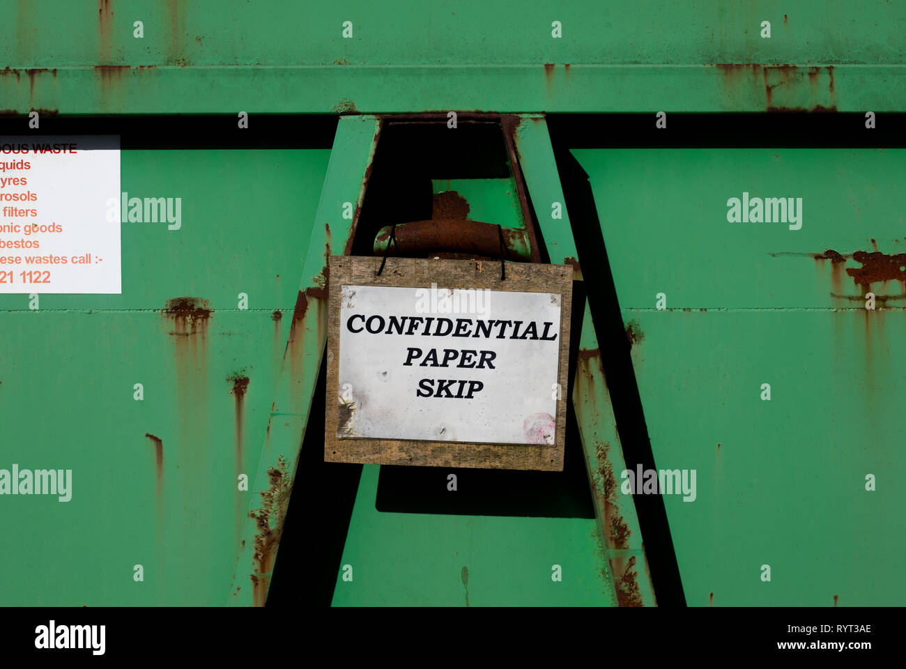 Confidential paper skip containing sensitive documents to be shredded ...
