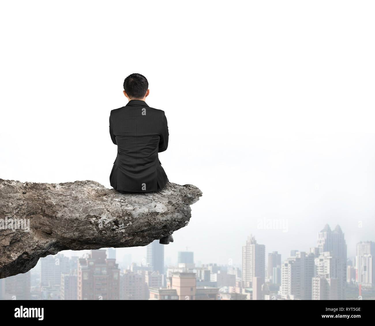 Businessman sitting on hill hi-res stock photography and images - Alamy