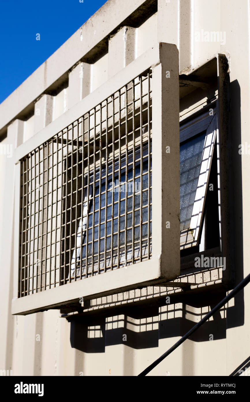 Window security wire mesh frame fixed externally to building wall to ...