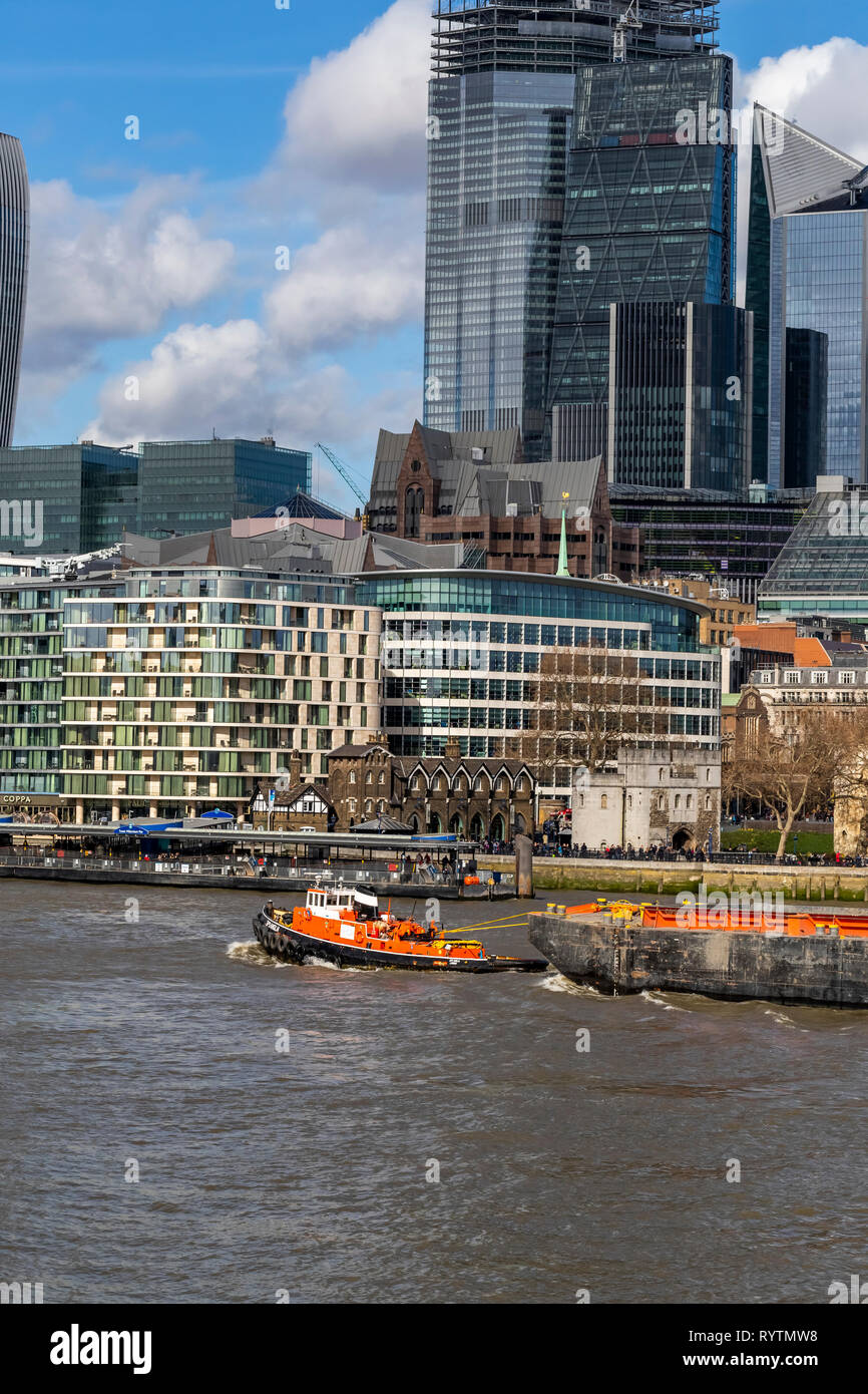 One of the many heavy load barges on the River Thames from the Queens ...