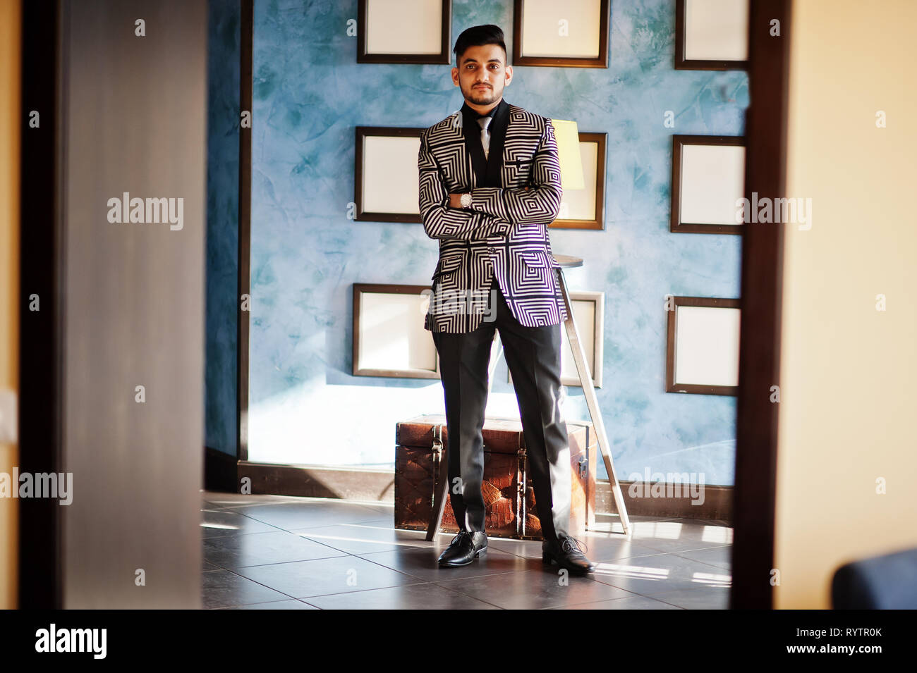 Young indian handsome business man at evening suit on restaurant ...