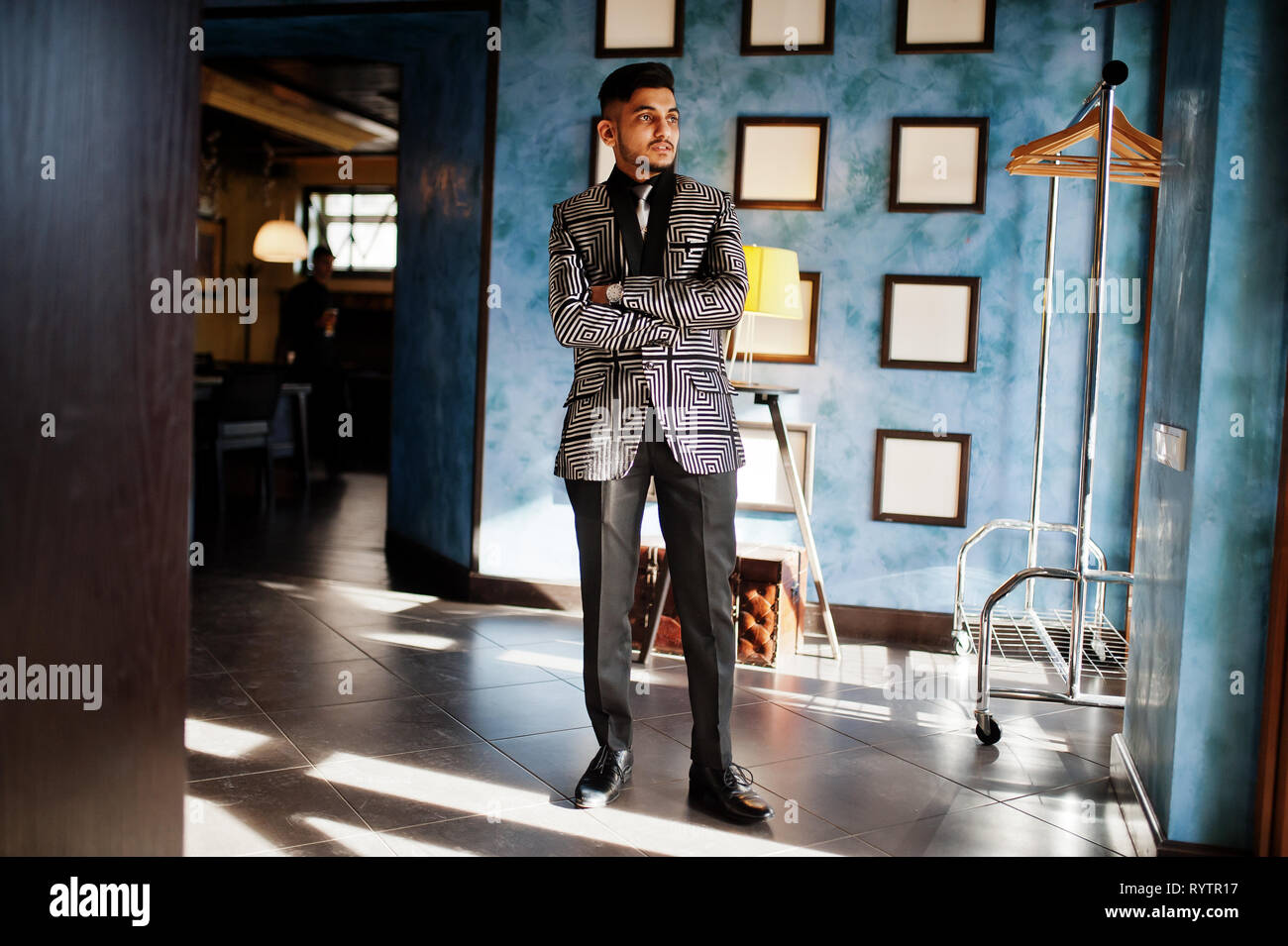 Young indian handsome business man at evening suit on restaurant ...