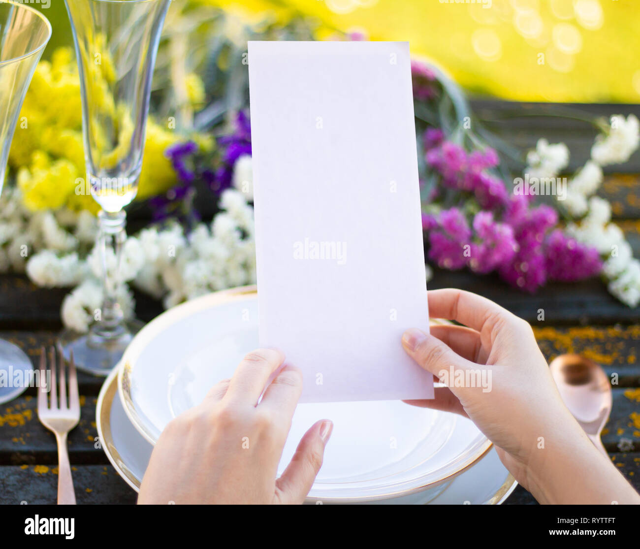 Hands holding a menu hi-res stock photography and images - Alamy