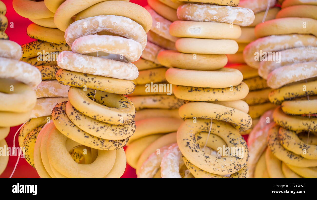 Lots of bread rolls hanging on the display these are Russian breads ...