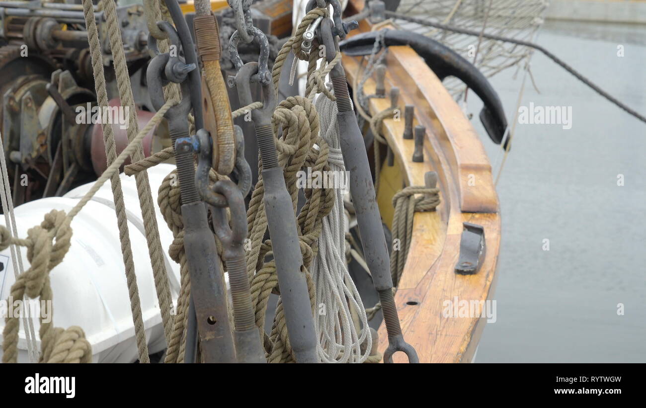 The ropes and metal bars on the side of the ship that is docking on the ...