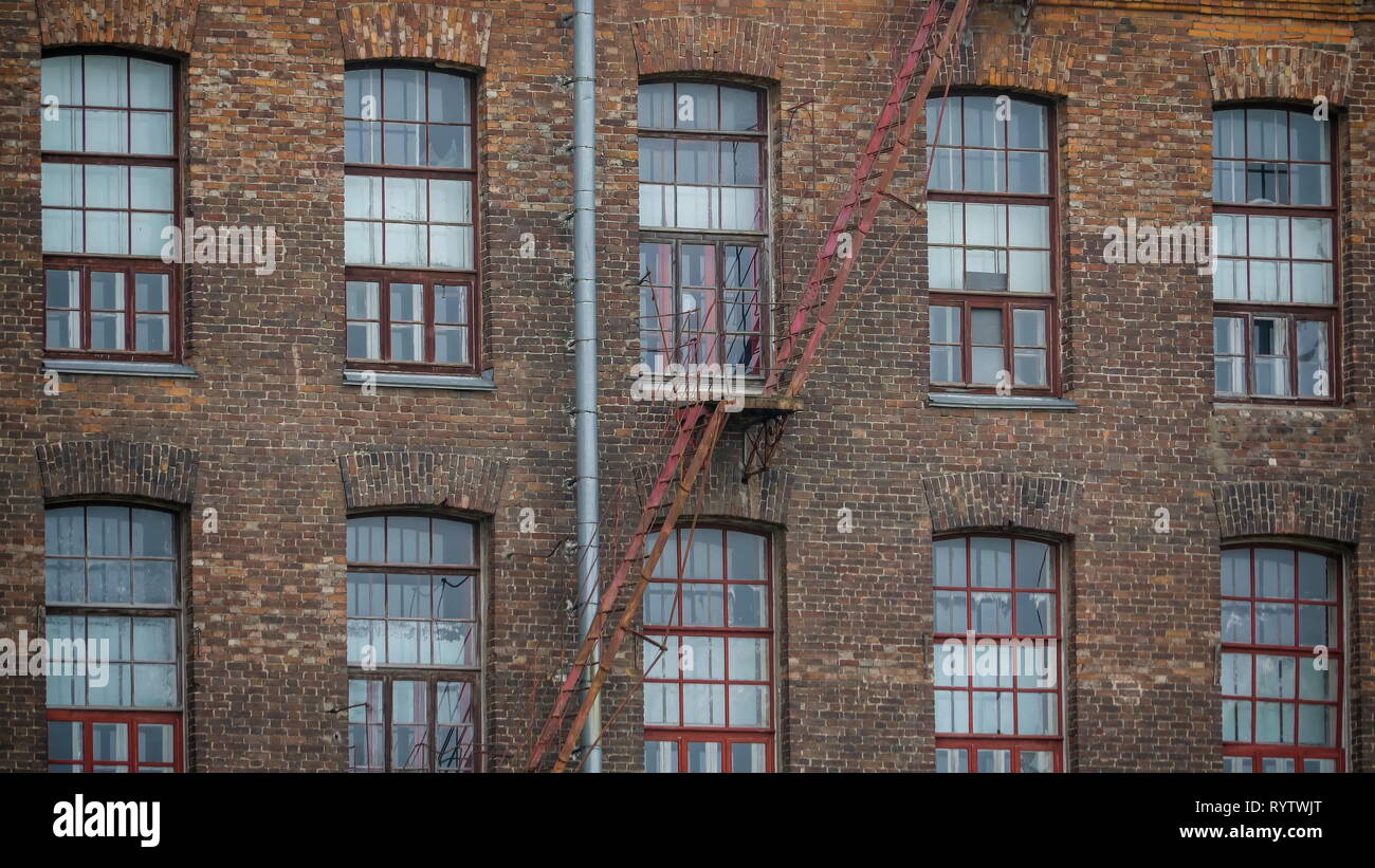 View of the big windows from the outside of the Kreenholm old textile ...