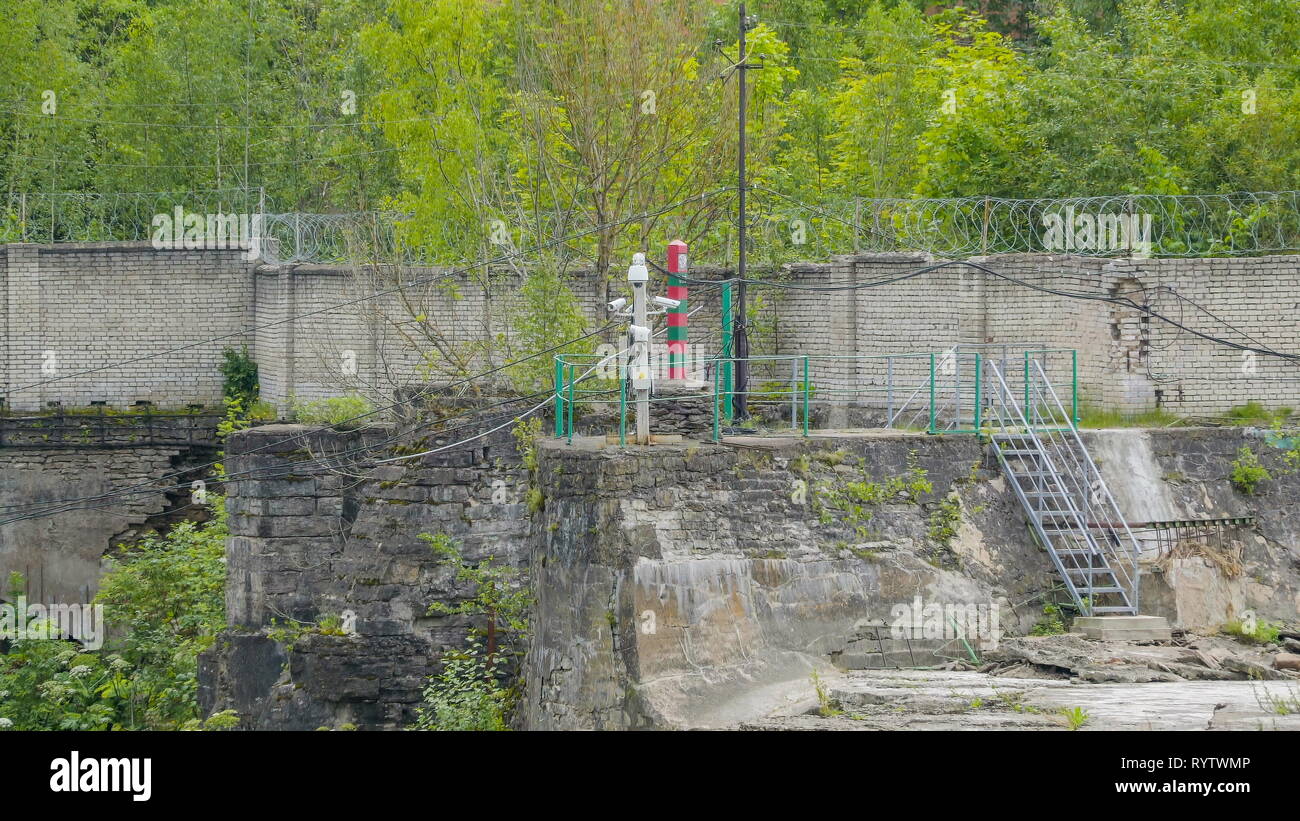 The Russian border from Narva Estonia it has plants and trees all over ...