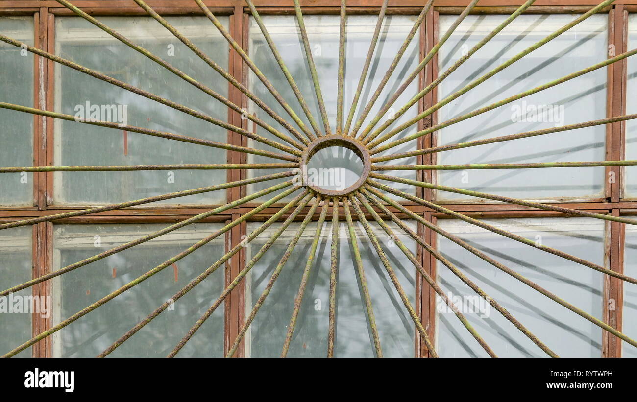 The grills on the big window of the building it is a steel grills with ...