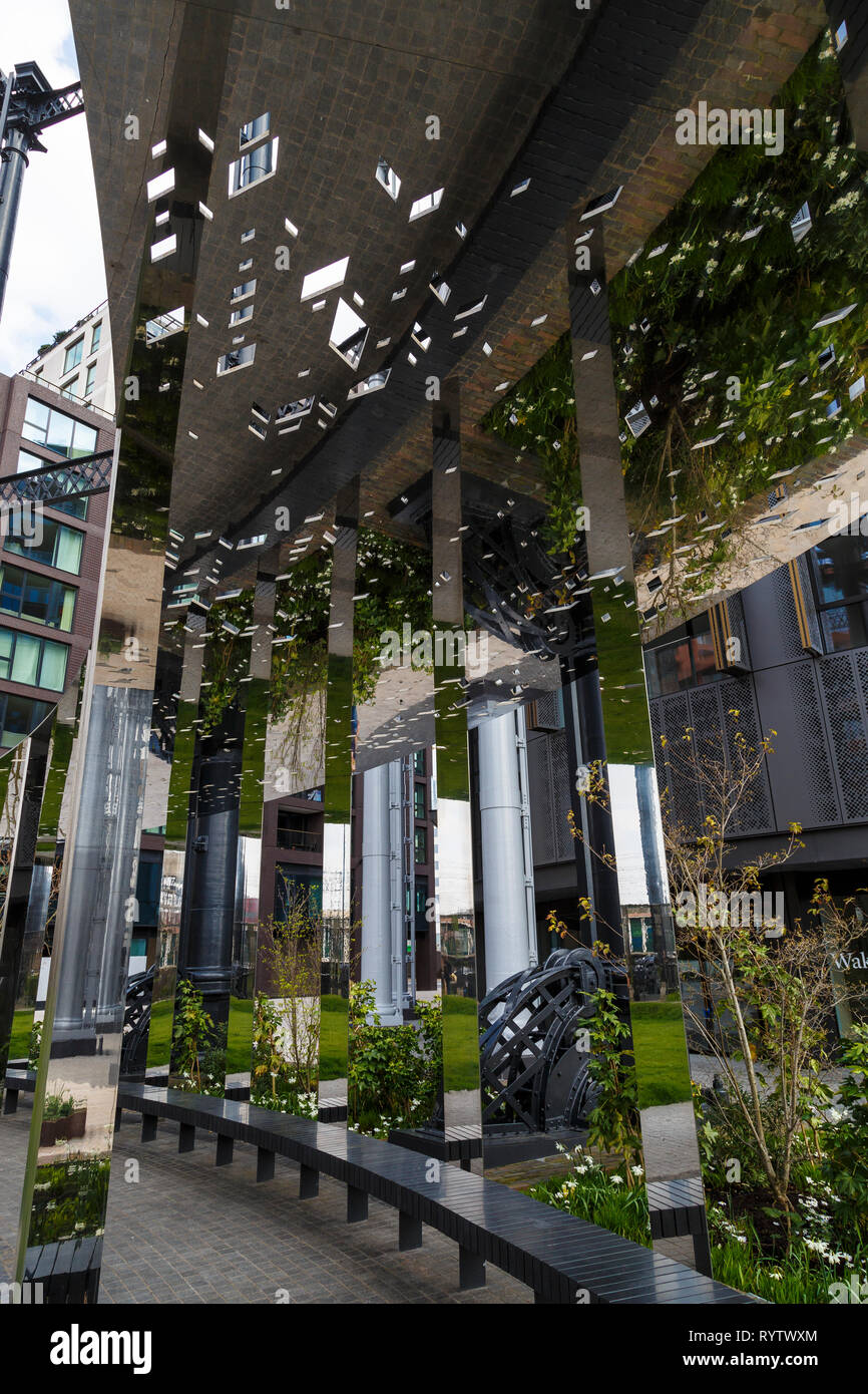 The mirrored walkway around Gasholder Park. Framed by restored ...