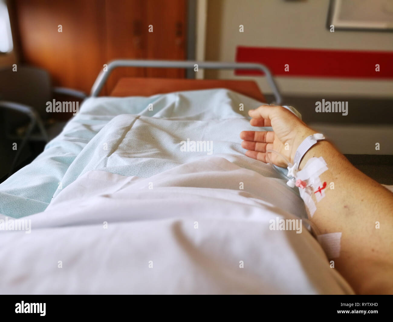 Intravenous drip arm hi-res stock photography and images - Alamy