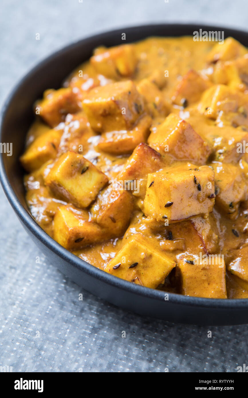 Creamy paneer curry. Glossy cottage cheese curry with spices. Cubes of ...
