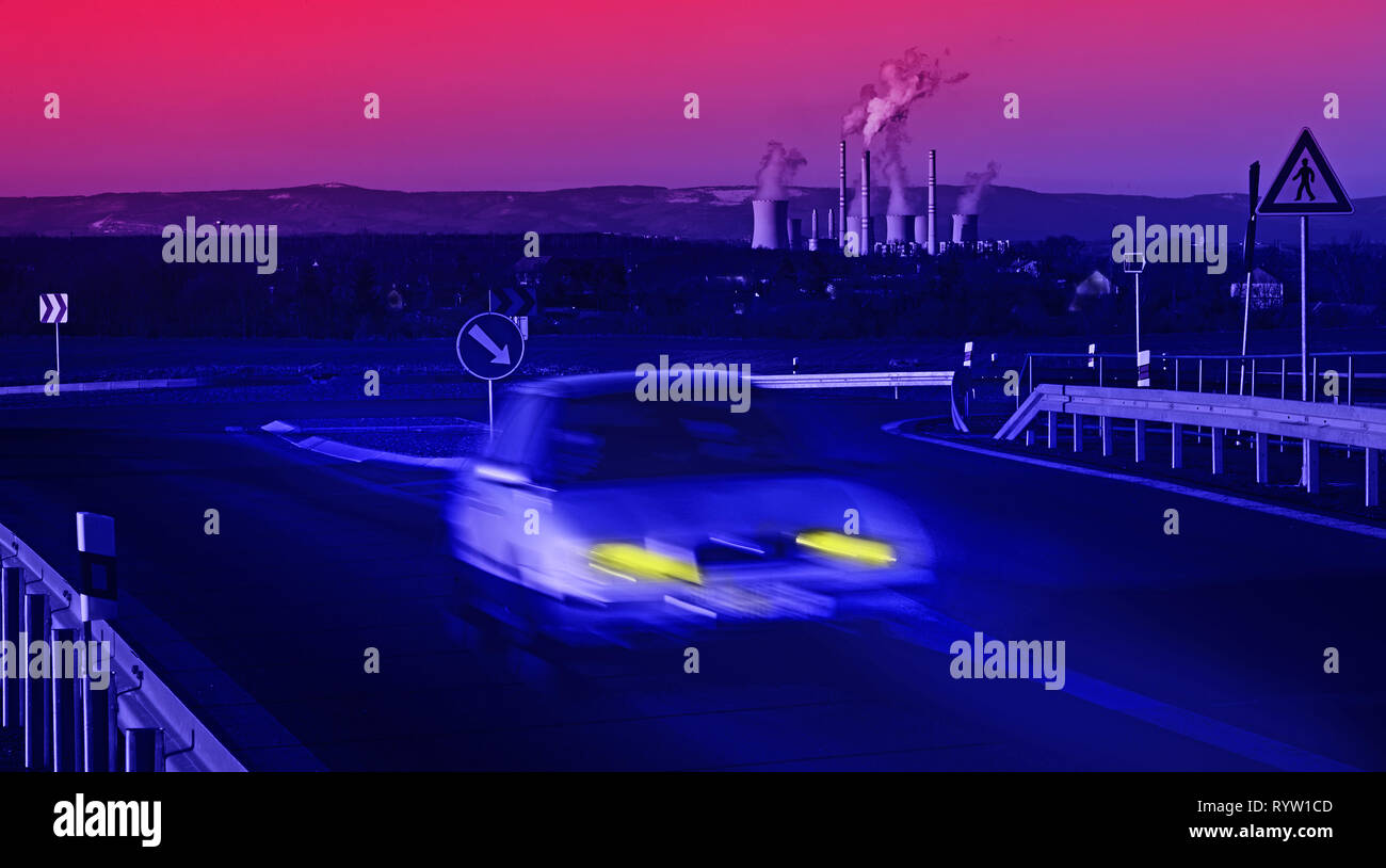 A car going in front of a power station at night Stock Photo - Alamy