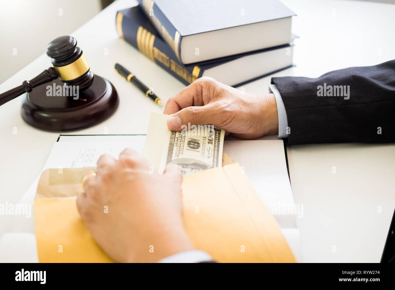 Lawyer receiving money as bribe hi-res stock photography and images - Alamy
