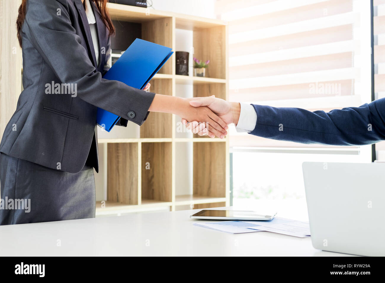 Two people having shaking hi-res stock photography and images - Alamy