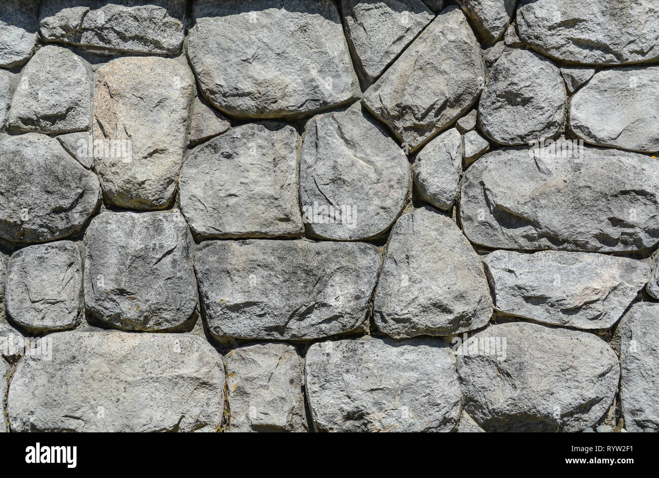 Grey stones in wall texture background. Modern building material Stock ...